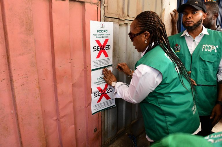 FCCPC storms popular Abuja market, seals shops re-bagging rice [PHOTOS]
